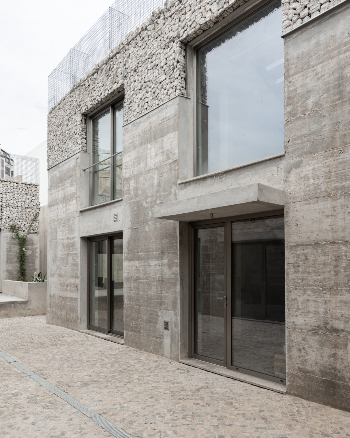 Three concrete façades in Faro, Portugal | by Corpo Atelier - Archisearch