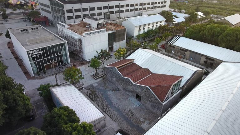 Archi-Union Architects designed Chi She bulging facade from recycled bricks