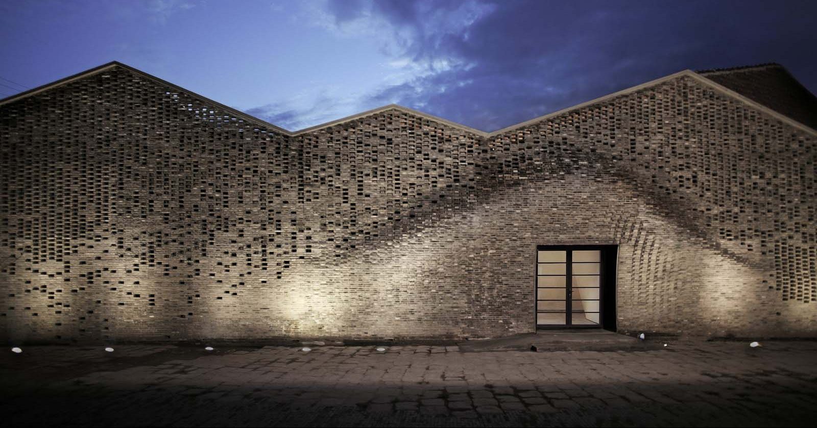 Archi-Union Architects designed Chi She bulging facade from recycled bricks